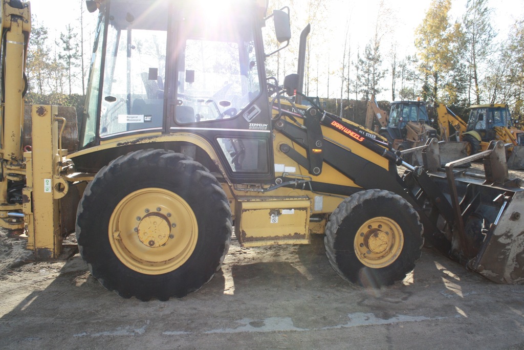 Koparko Ładowarka CAT 438 C 428 - 7646542293 - oficjalne archiwum Allegro